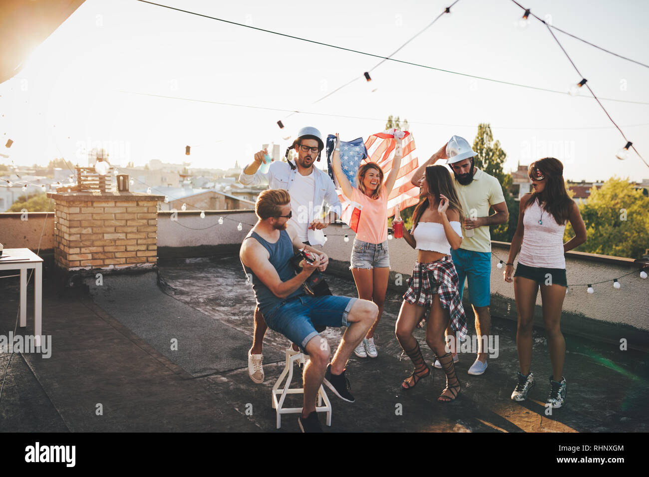Group of friends dancing outdoors hi-res stock photography and images ...