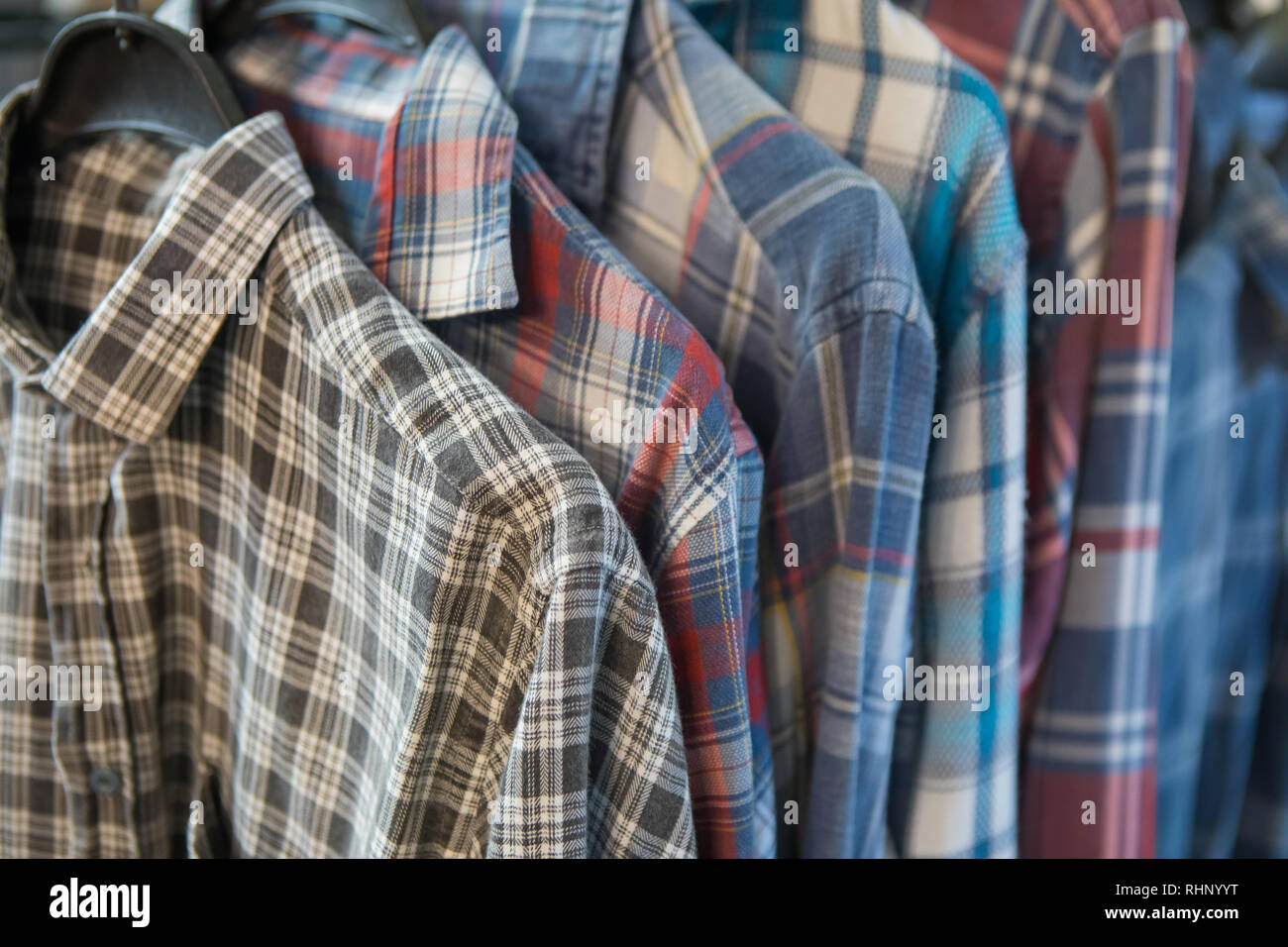 Group of Colored Cotton Shirts. Assorted shirt fabric samples. Textured ...