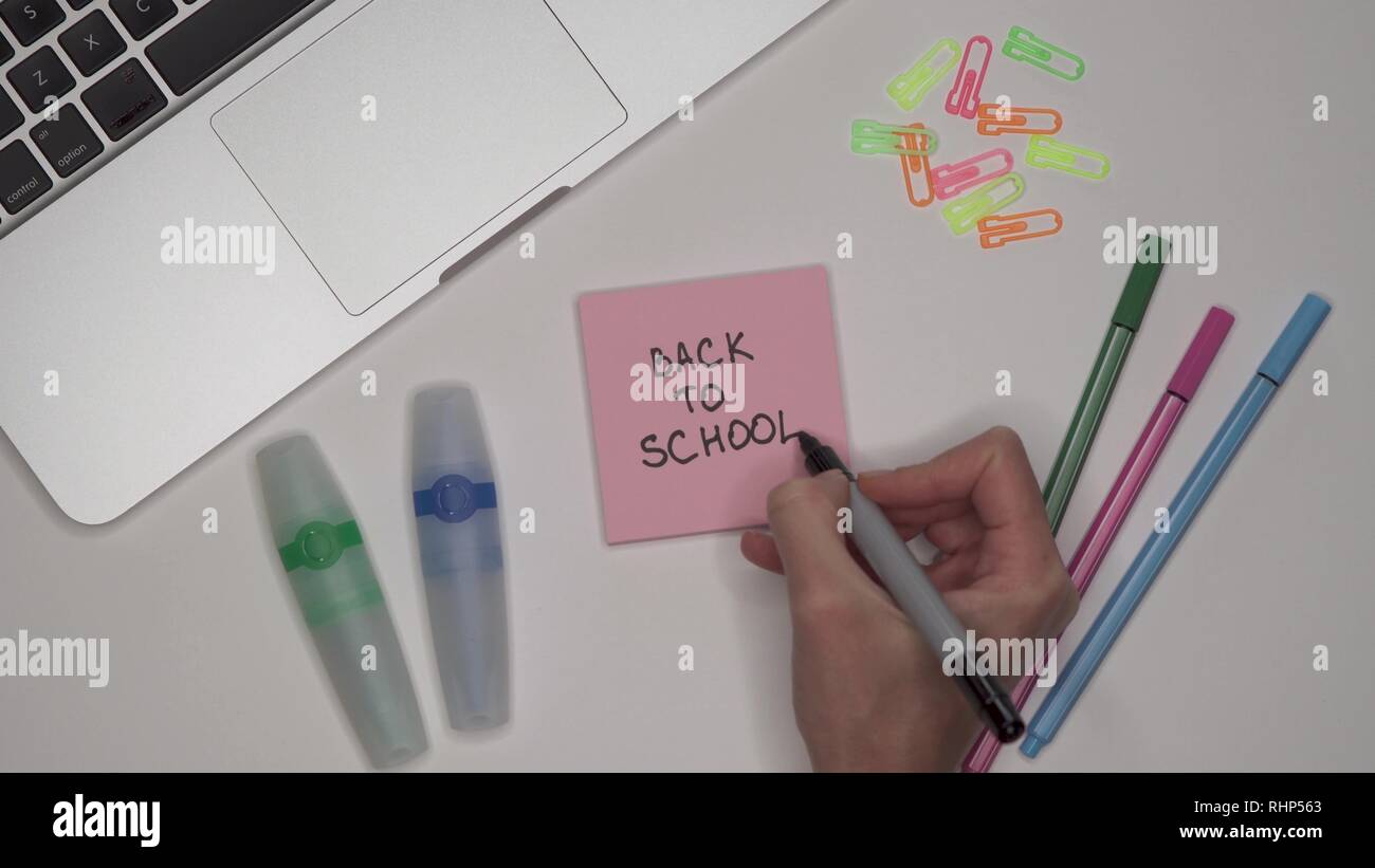 School concept. BACK TO SCHOOL on notepad. School supplies and ...