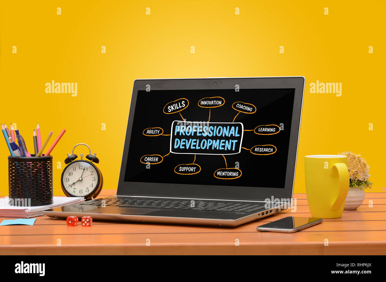 Professional development on a laptop with saturated background Stock ...