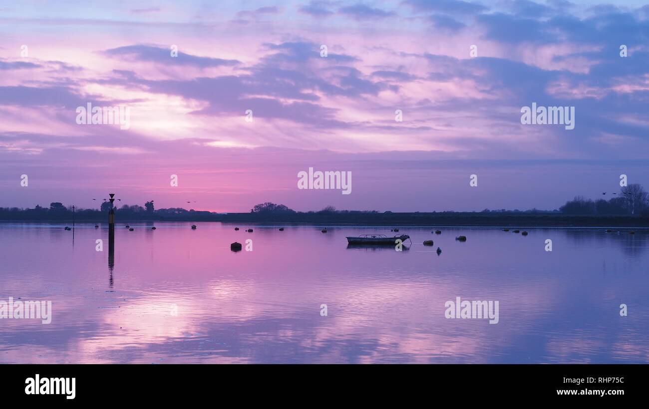 sunset stages at bossom harbour Stock Photo - Alamy