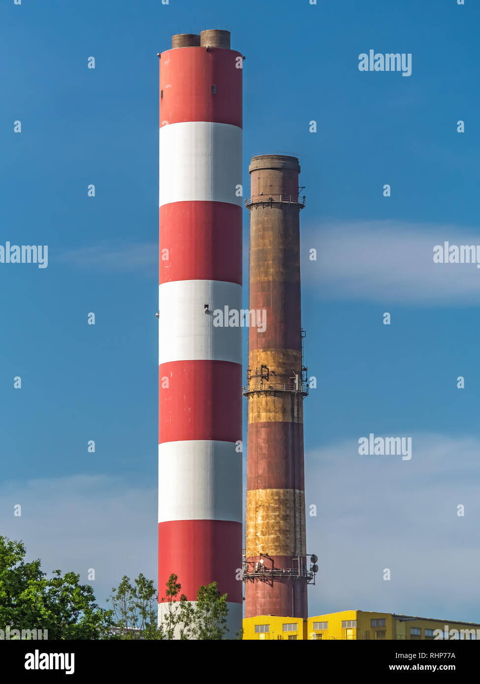 Closeup of heat and power generating plant chimneys Stock Photo - Alamy