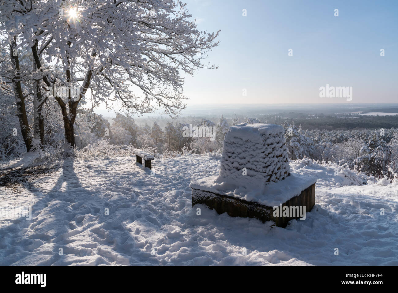 Pretty snow scene at Trig Point on Crooksbury Hill, Farnham with sun ...
