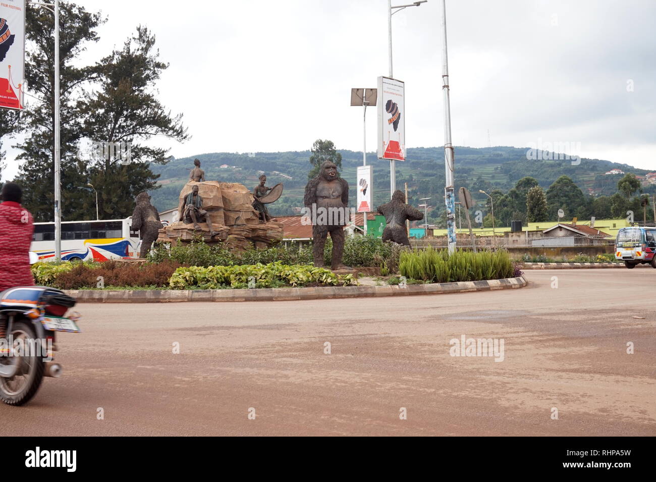 A roundabout with human and gorilla statues on roundabout, Kabale ...