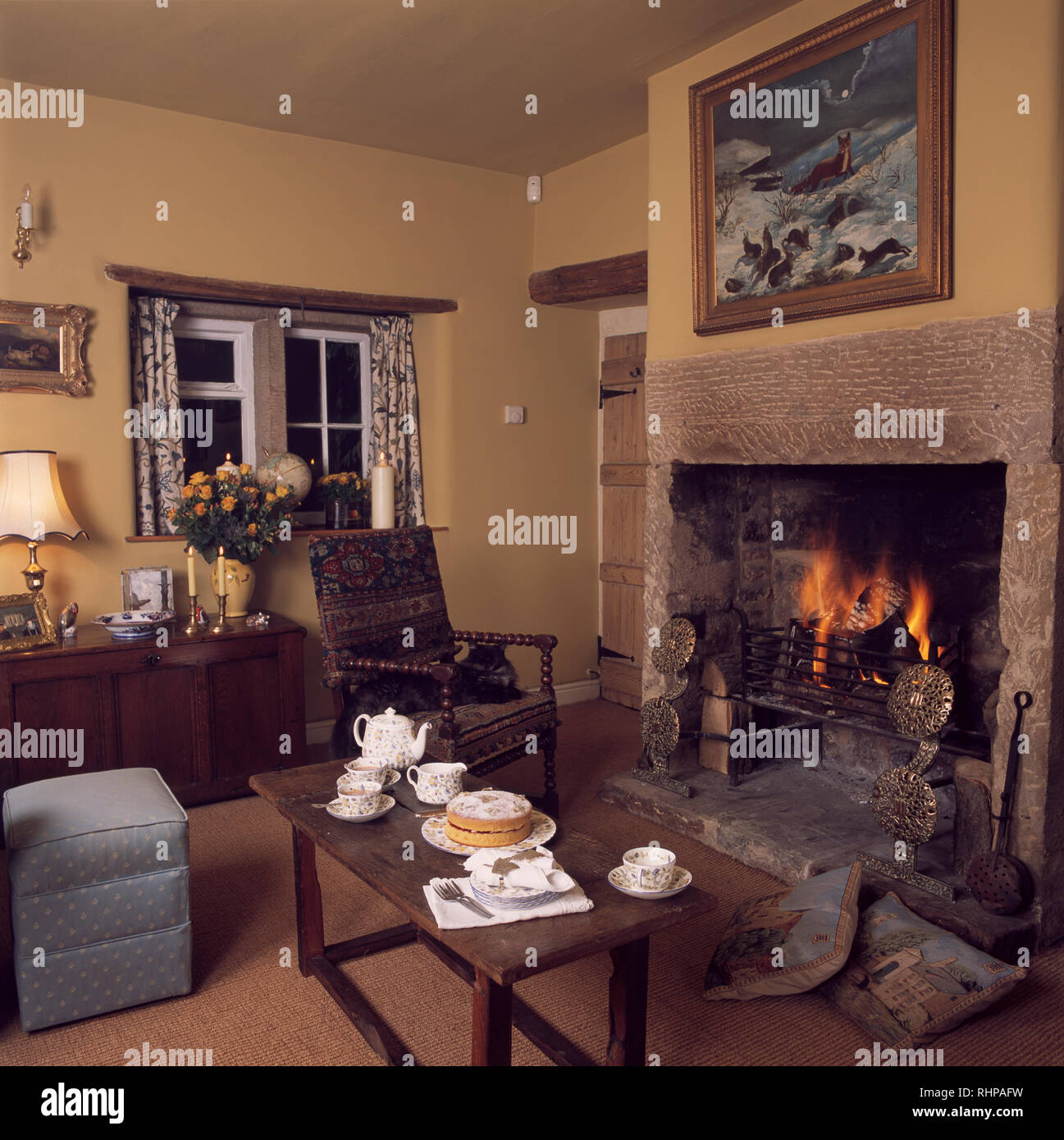 Sitting beside fire hi-res stock photography and images - Alamy