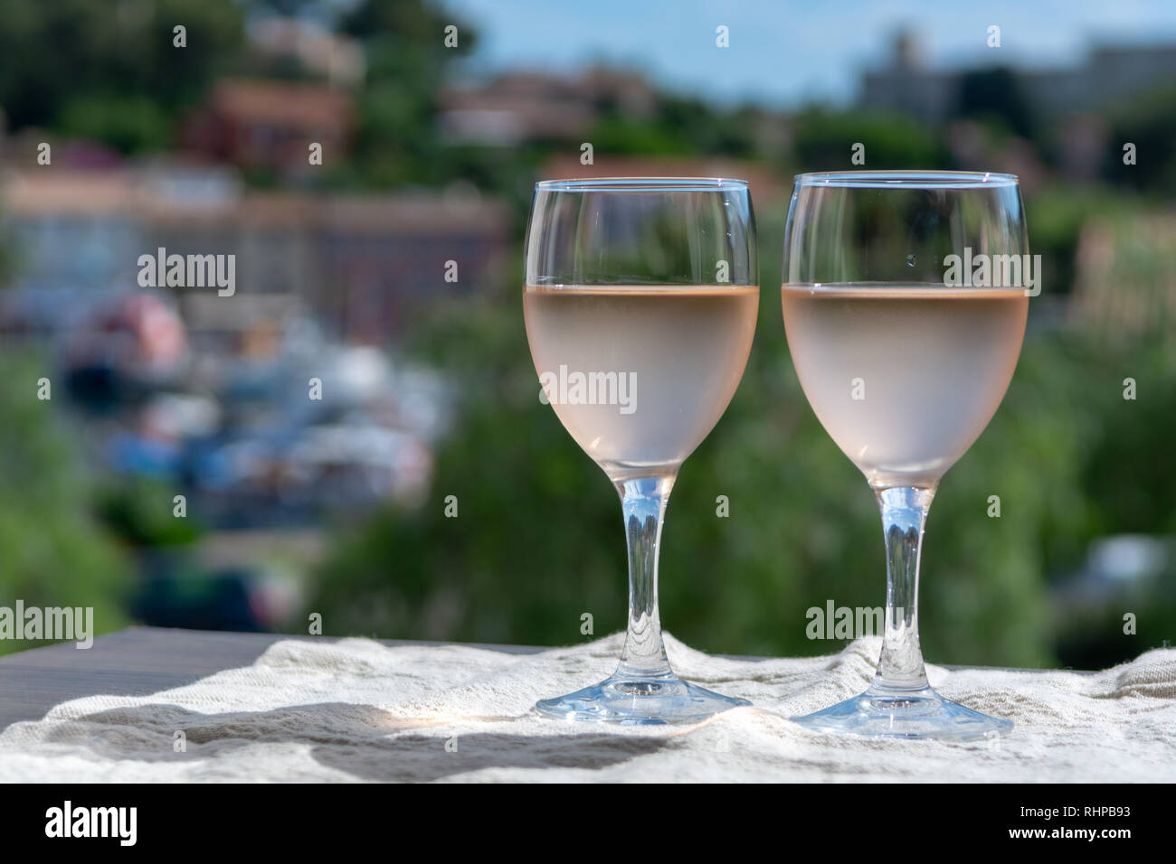 Rose wine of Provence, France, served cold on outdoor terrace in two ...