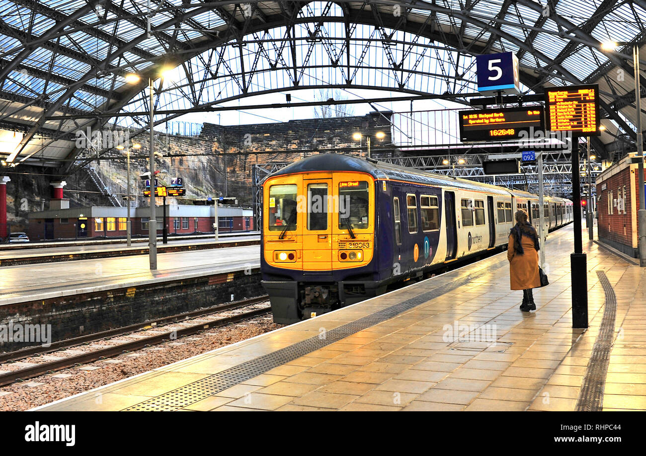 Train arriving at Liverpool Lime Street railway station at dusk in ...
