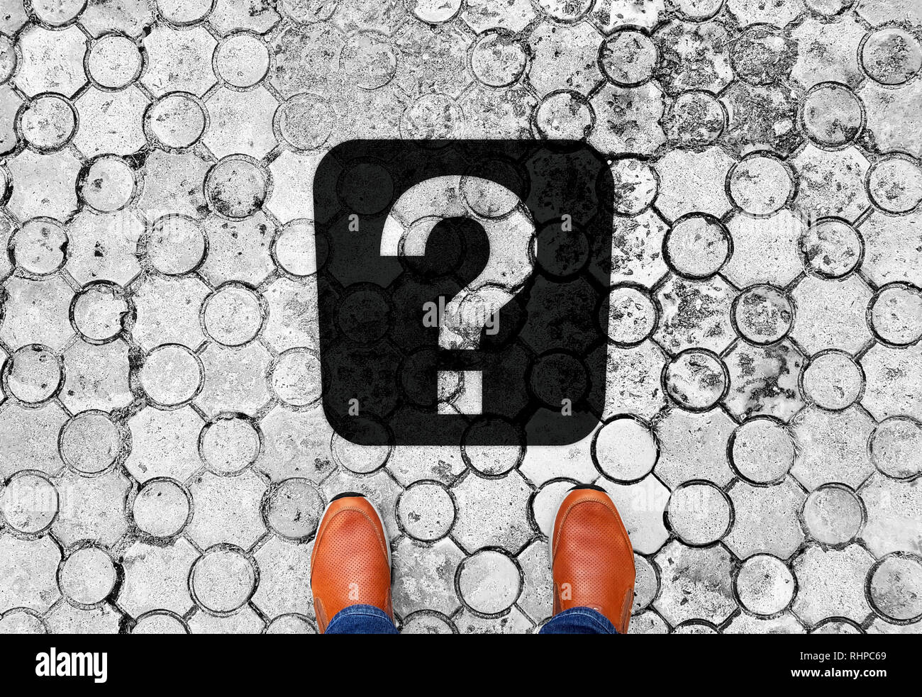 Brown shoes standing on the street with question mark; Life chaoices ...