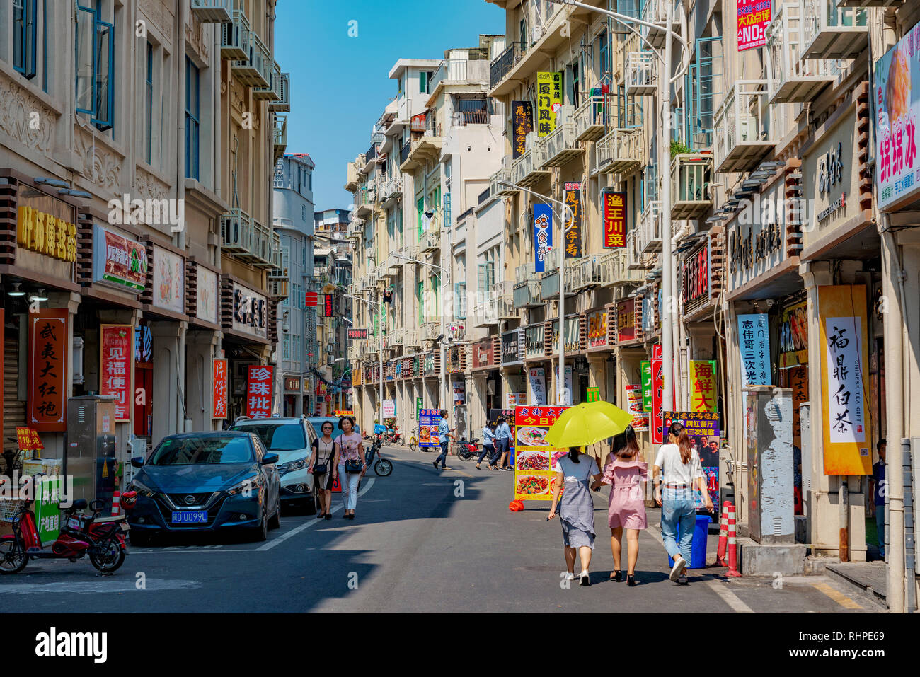 XIAMEN, CHINA -OCTOBER 09: This is a local shopping street near ...