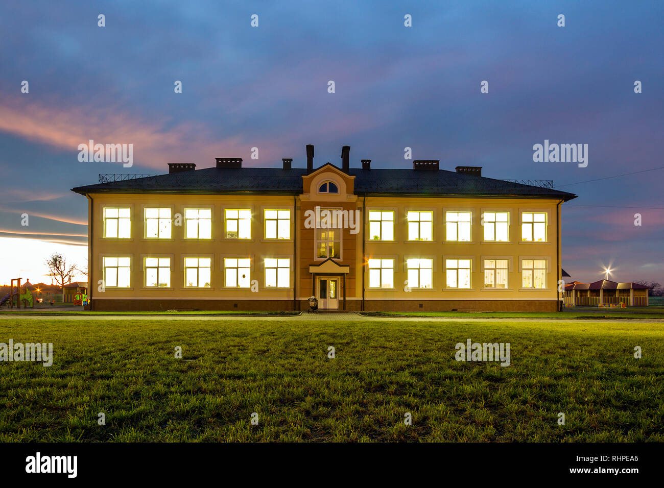 New modern two-storied kindergarten preschool building with brightly ...