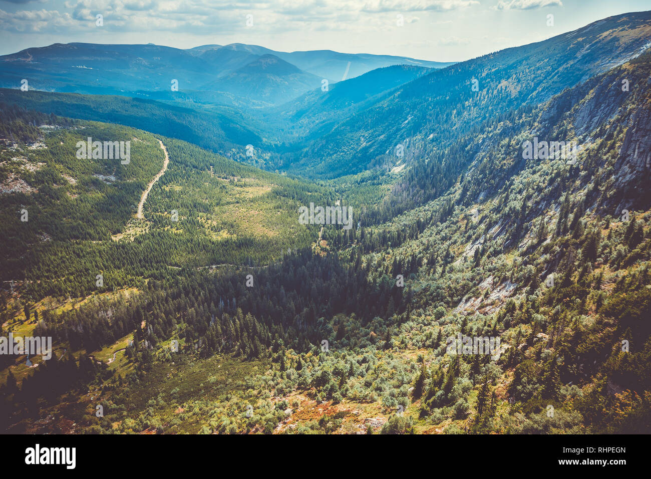Scenic sight of czech giant mountains valley and spruce forest at ...