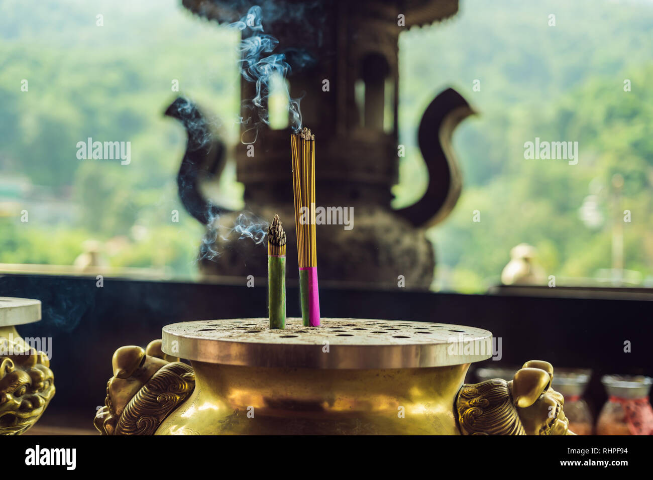 Burning aromatic incense sticks. Incense for praying Buddha or Hindu ...