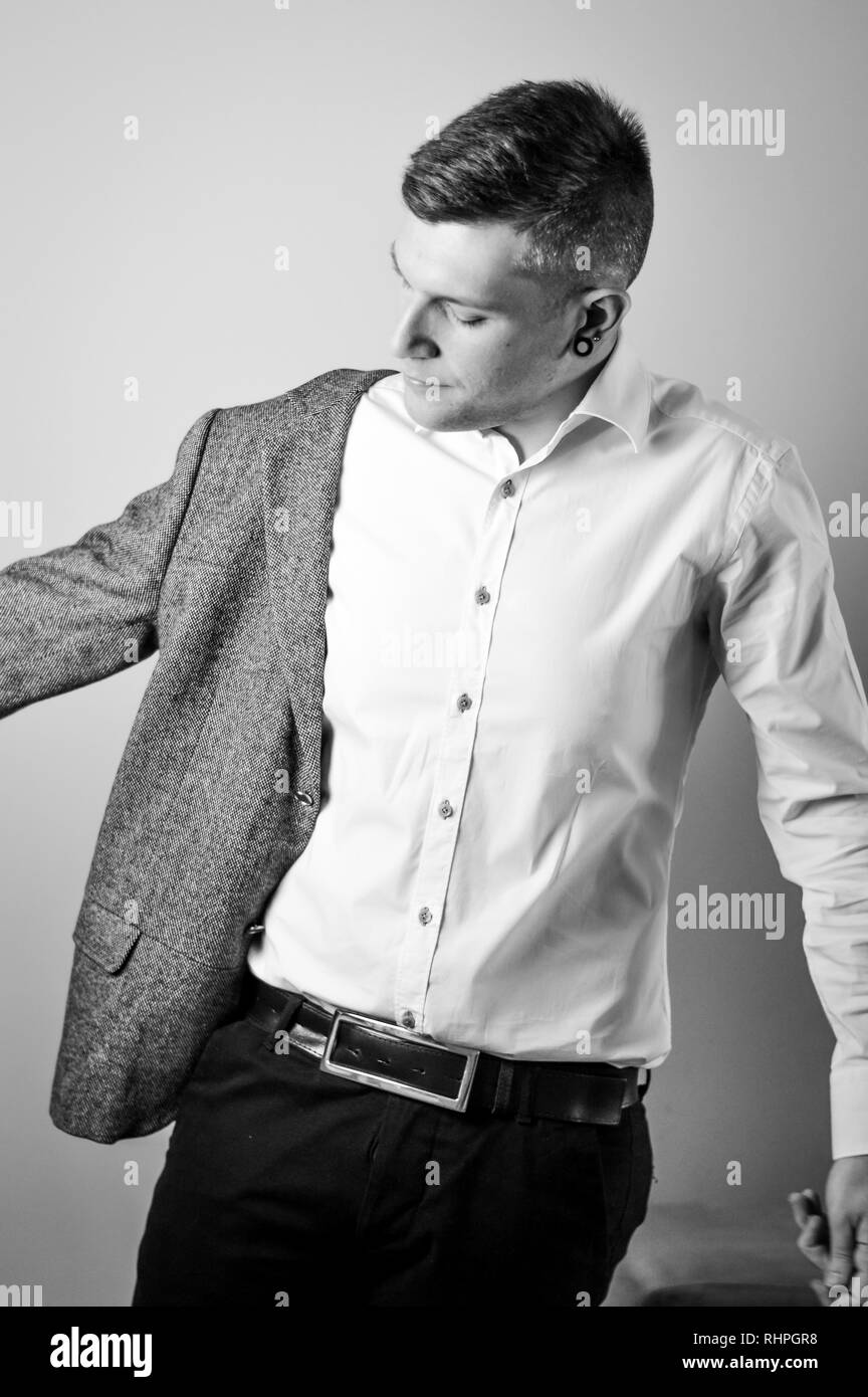 Fashion portrait of confident young man Stock Photo - Alamy