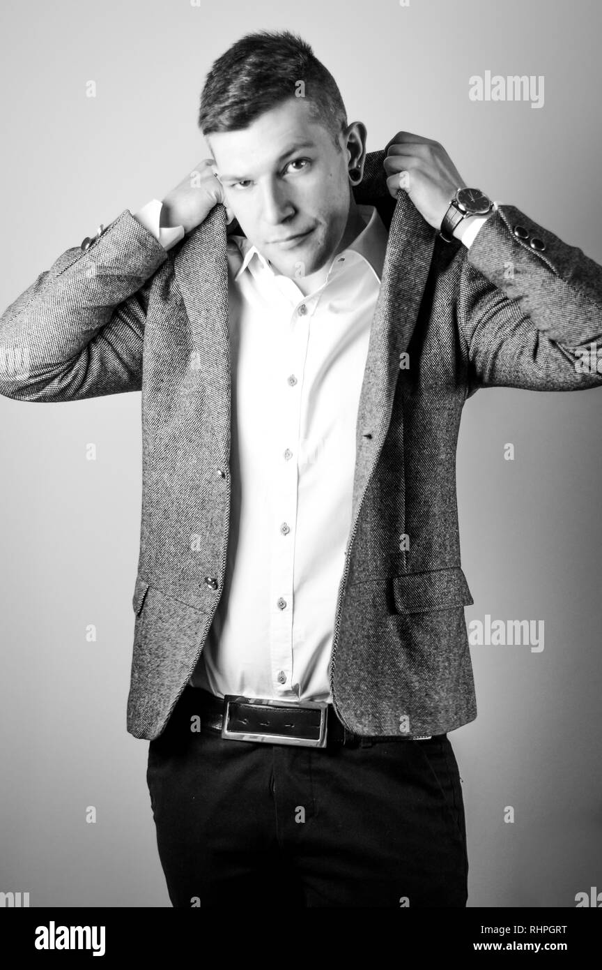 Fashion portrait of confident young man Stock Photo - Alamy