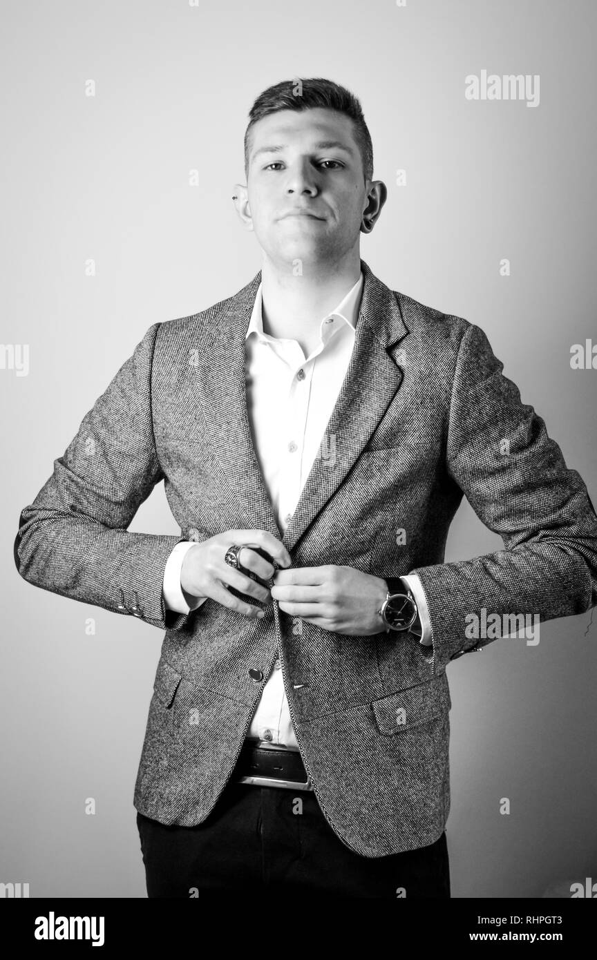 Fashion portrait of confident young man Stock Photo - Alamy