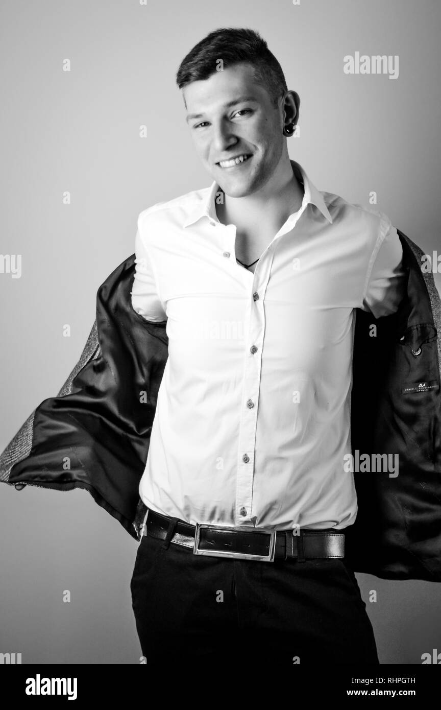 Fashion portrait of confident young man Stock Photo - Alamy