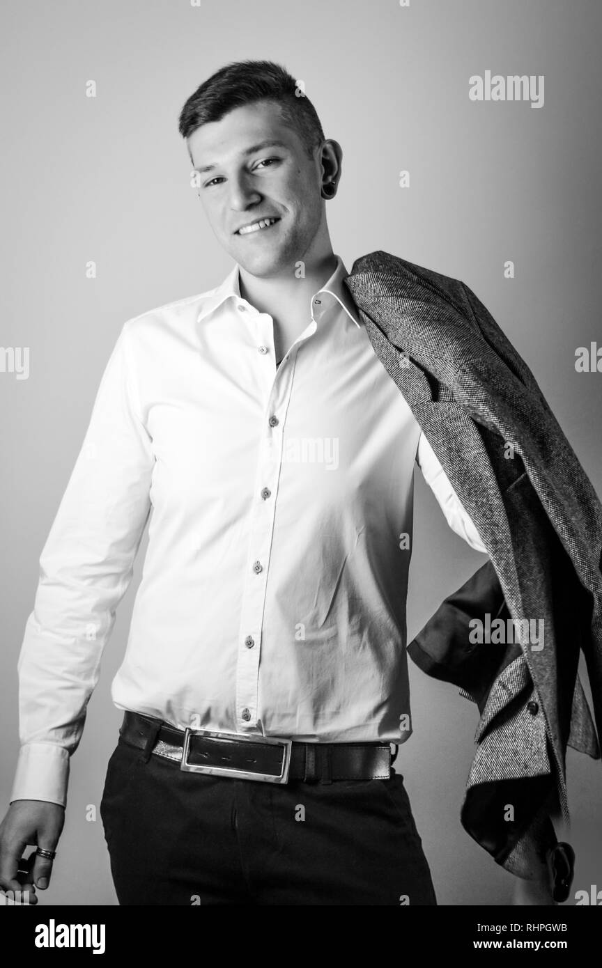 Fashion portrait of confident young man Stock Photo - Alamy