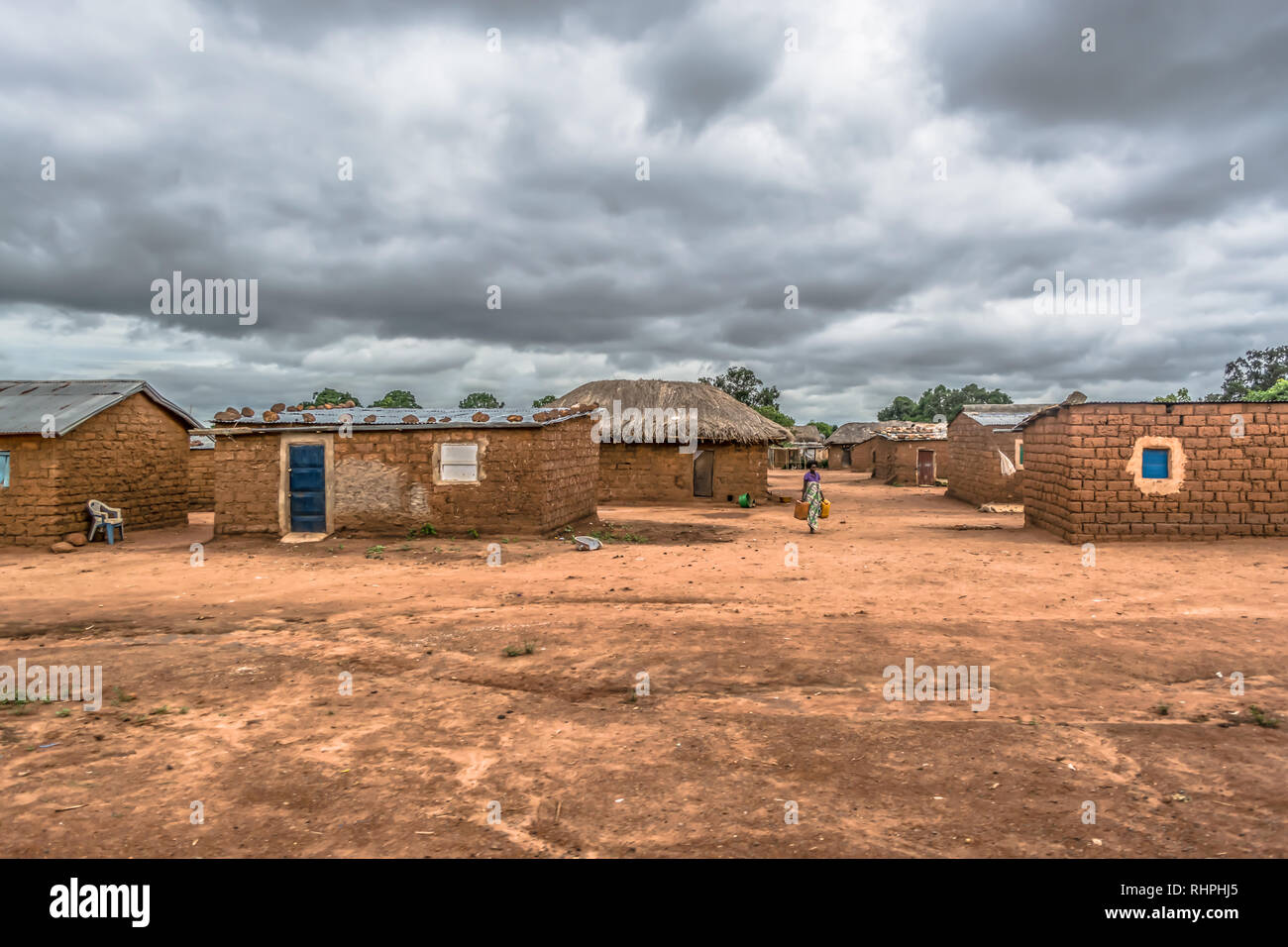 Malange / Angola - 12 08 2018: View of traditional village, woman ...