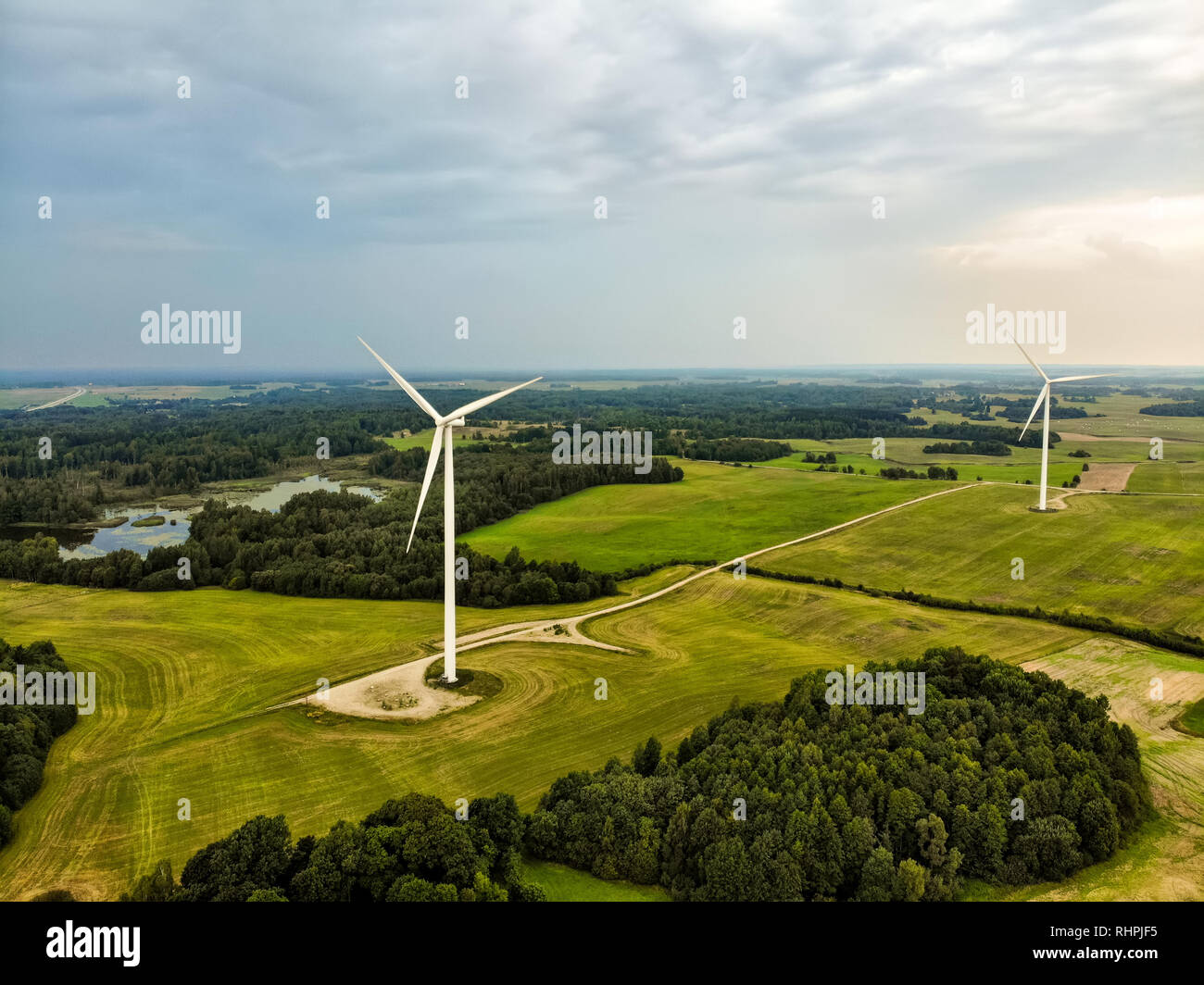 Aerial view of wind turbines generating power, located in Lithuania, on ...