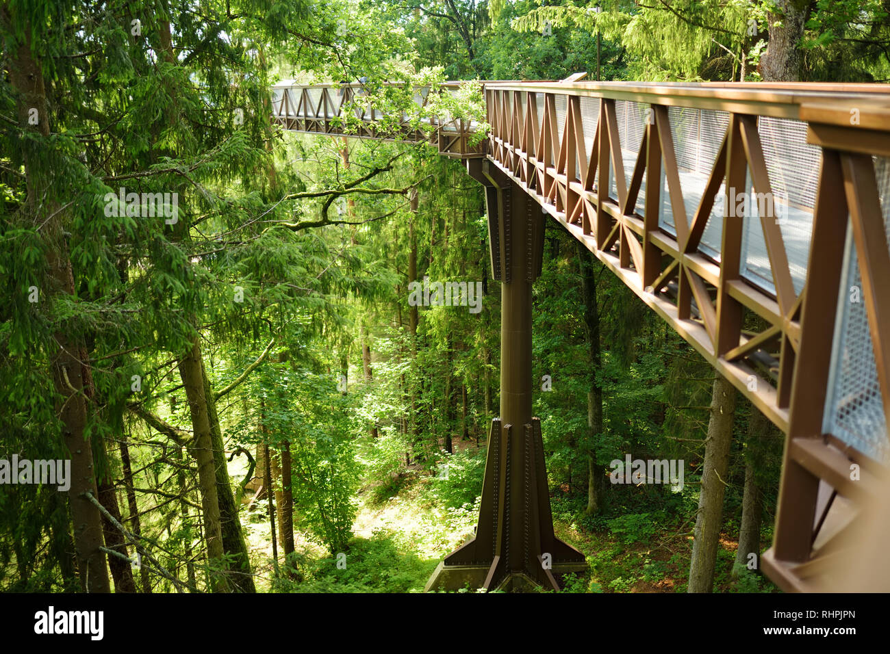 Laju takas, tree-canopy trail complex with a walkway, an information ...