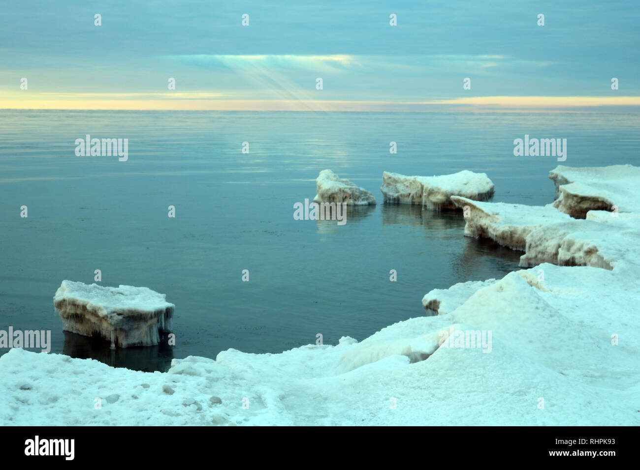 Ice formations with frozen lakefront Stock Photo - Alamy