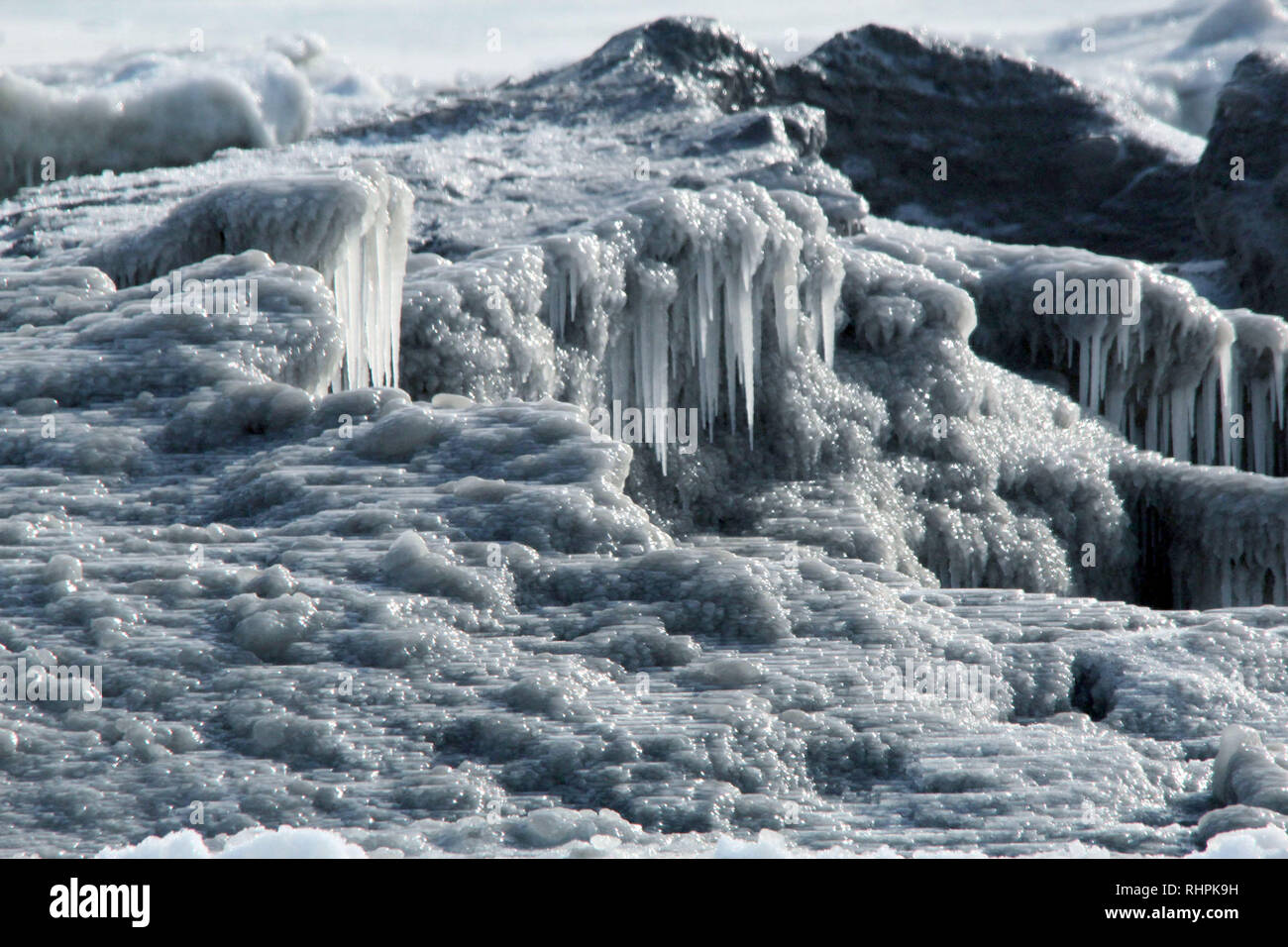 Ice formations at lake front Stock Photo - Alamy