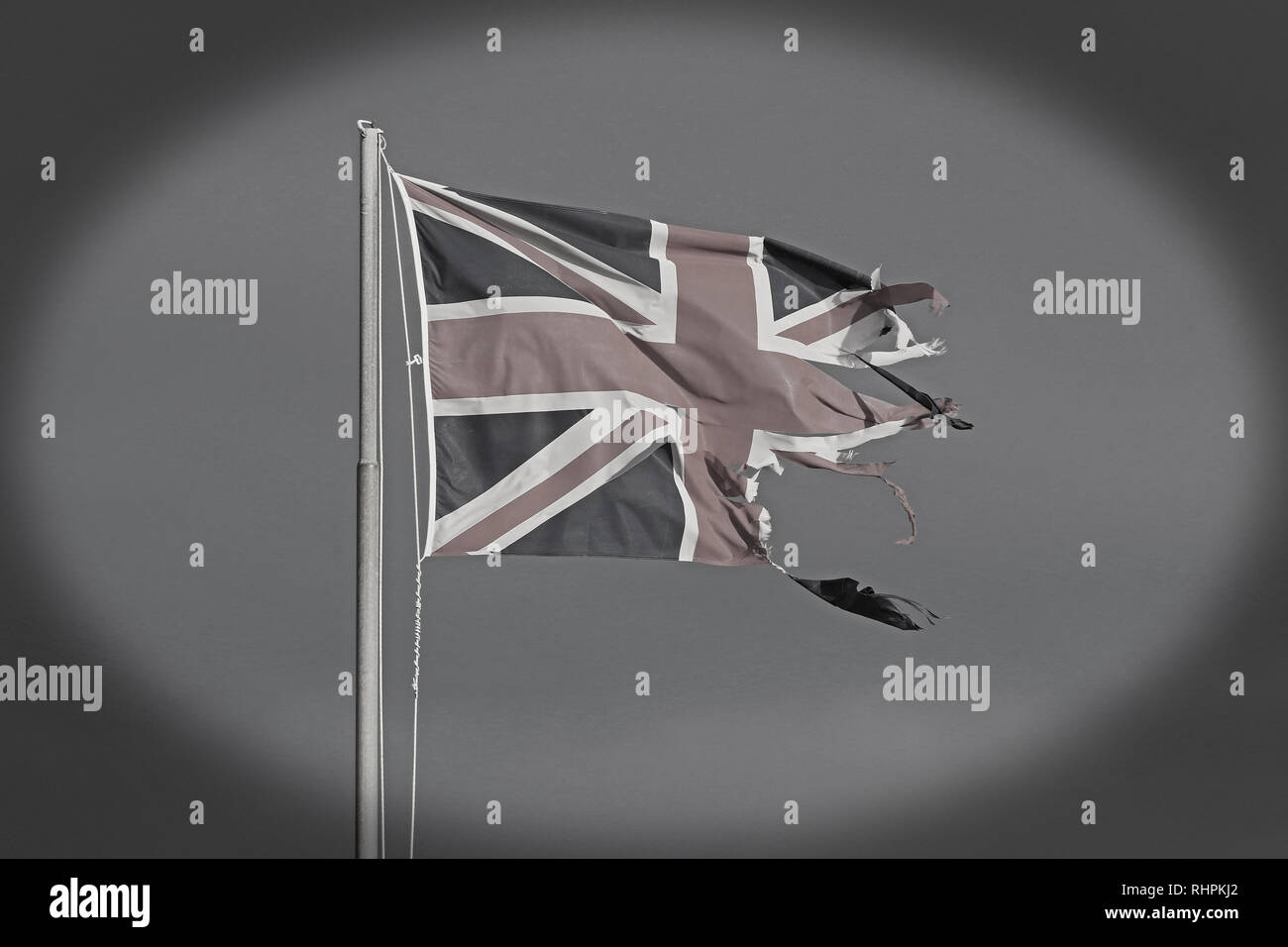 washed out and faded color image of a British flag or Union Jack torn ...