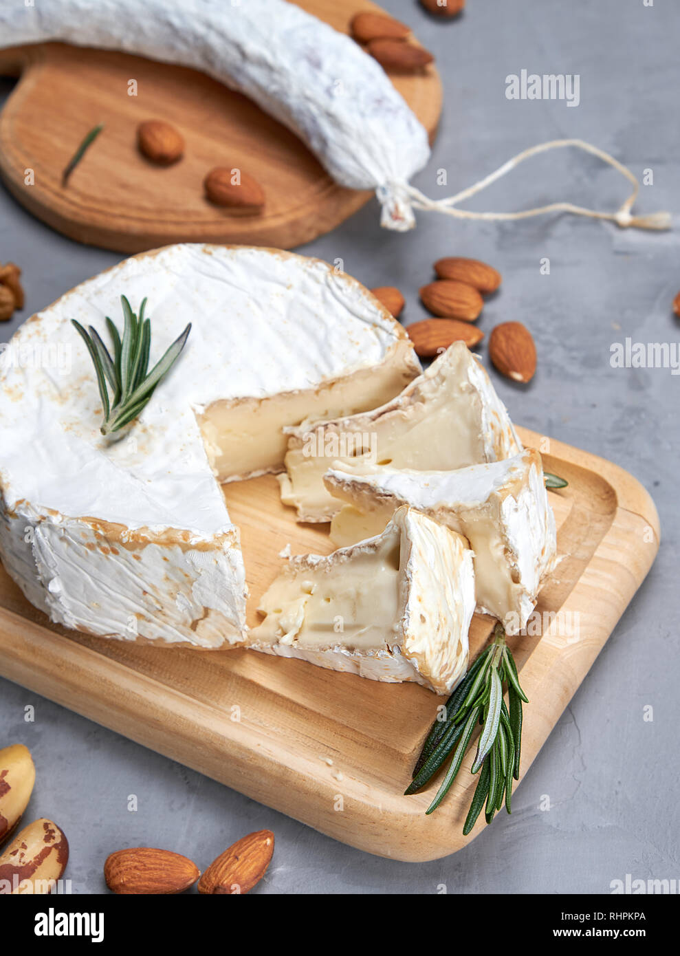 Round piece brie cheese sausage hi-res stock photography and images - Alamy