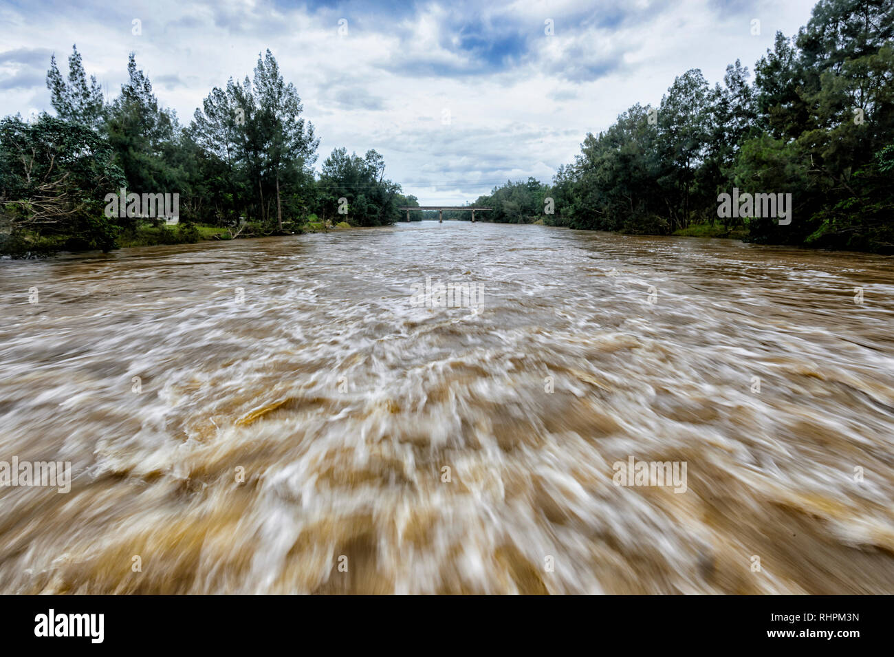 Fast flowing Barron River in full flood during monsoon, Cairns, Far ...