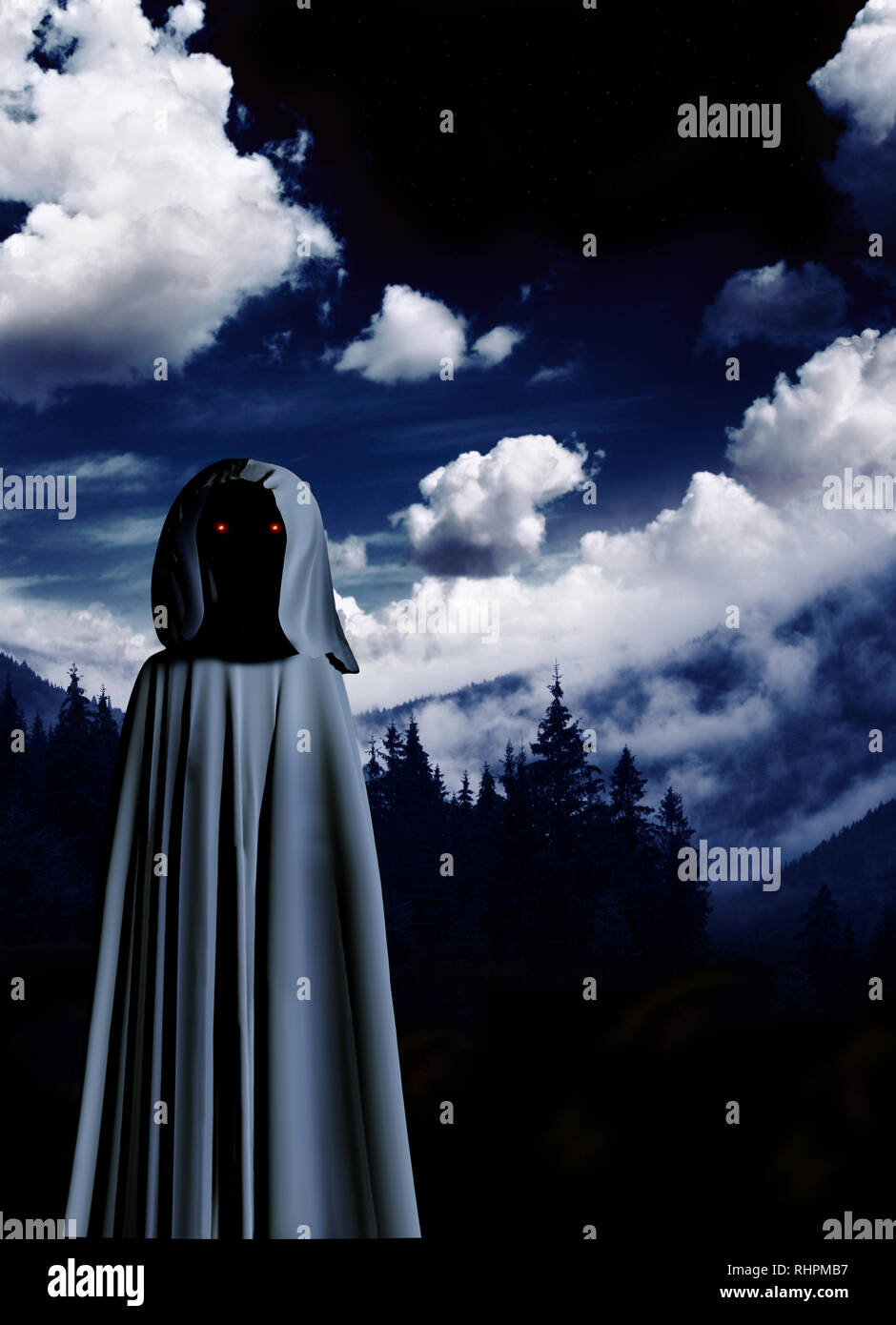 Spooky monster in hooded cloak with glowing eyes in misty forest ...