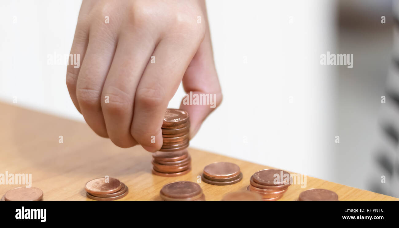 Coin stacking hi-res stock photography and images - Alamy