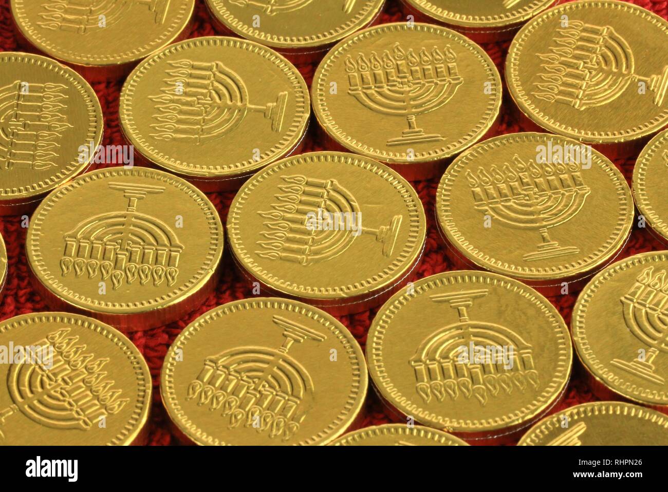 Gold Jewish candy coins Stock Photo - Alamy
