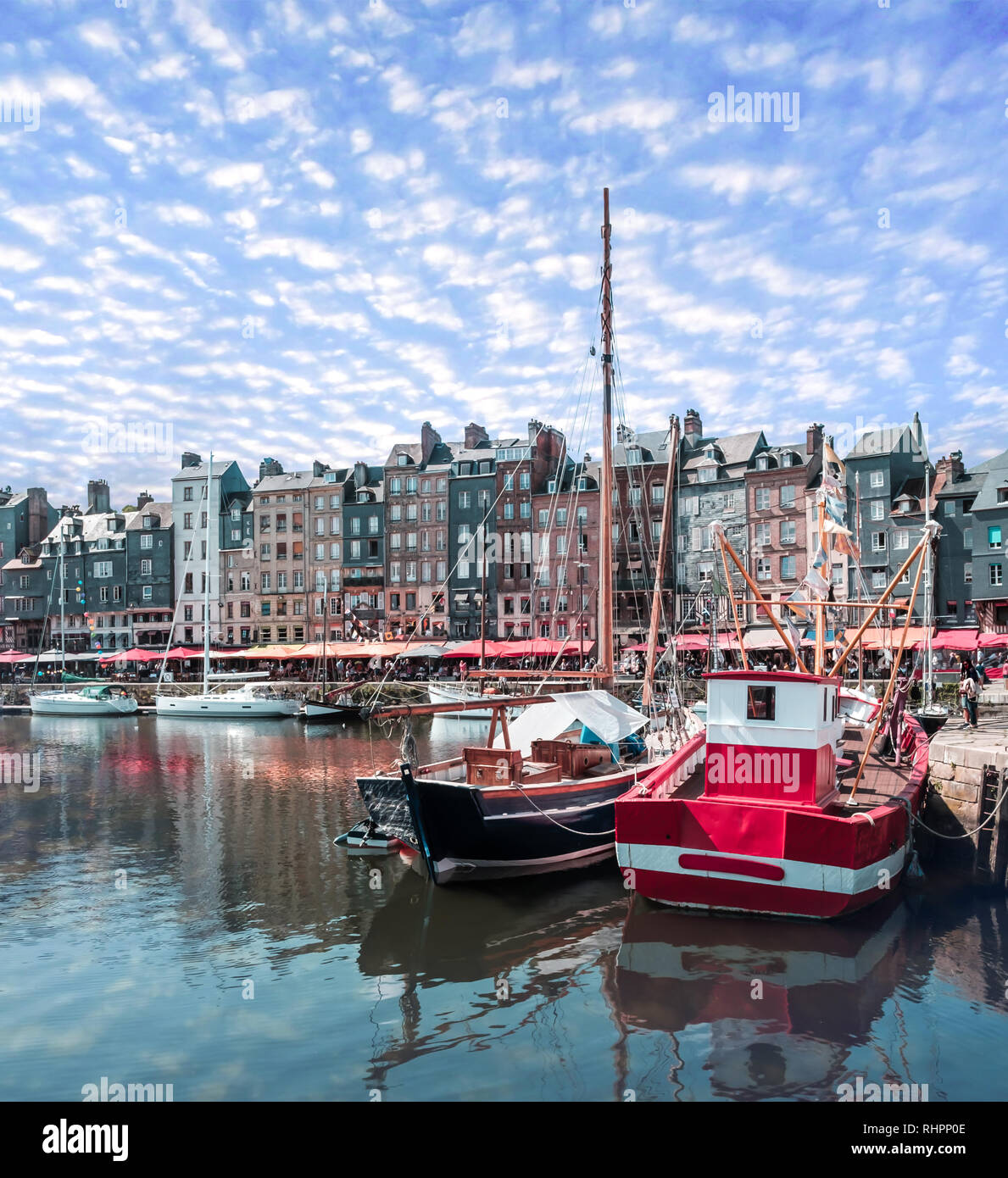 Funky sky above the village of Honfleur in Normandy, France Stock Photo ...