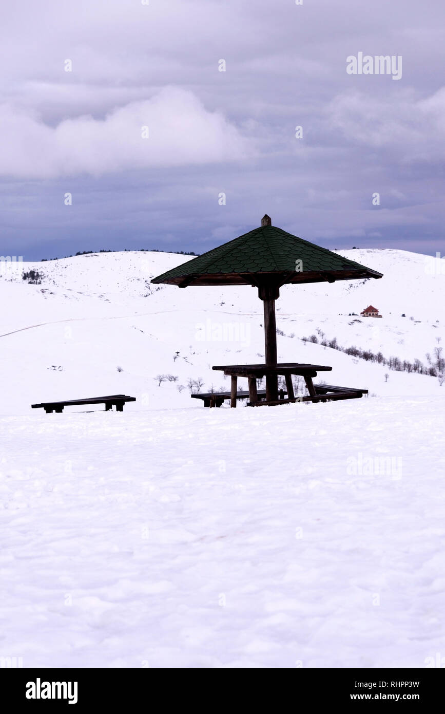 Sunshade in the mountain with snow Stock Photo - Alamy