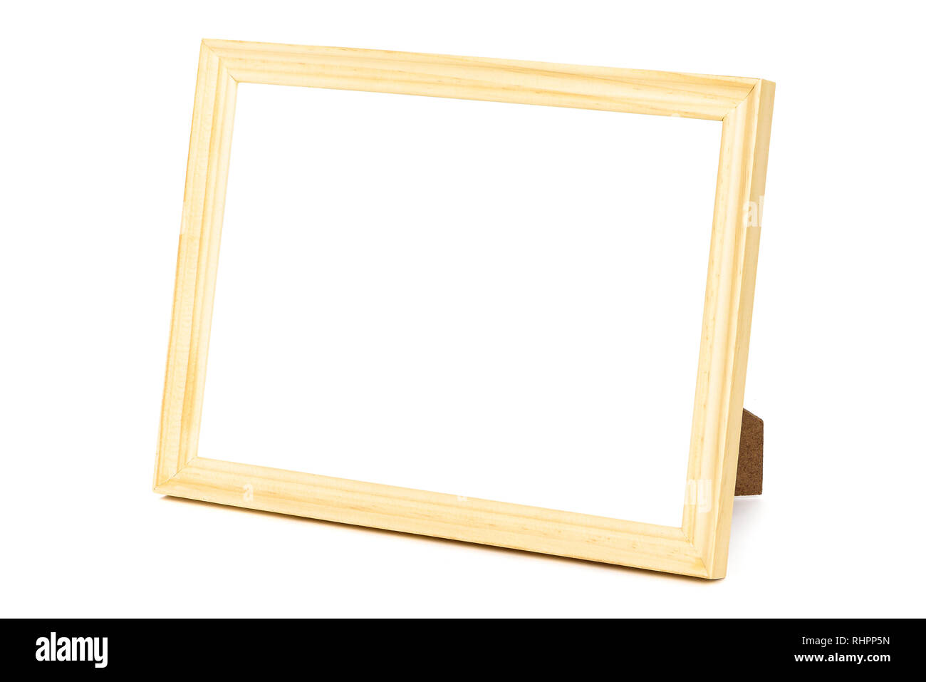 Standing wooden picture frame isolated on white background with ...