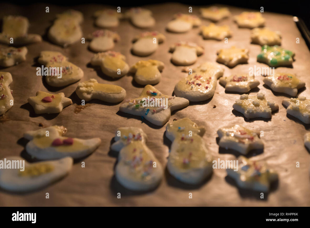 Baking tray with delicious cookies in oven Stock Photo - Alamy