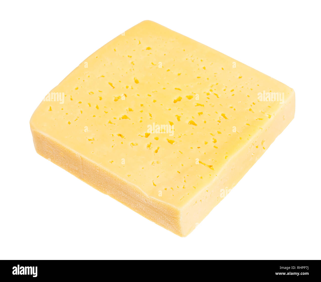 thick piece of yellow semi-hard cow's milk cheese isolated on white ...
