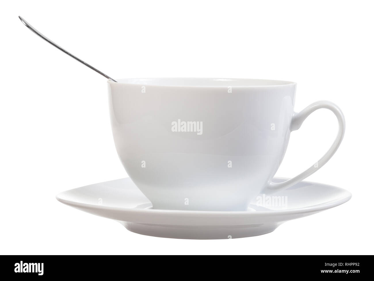 side view of white porcelain cup with spoon and saucer isolated on ...