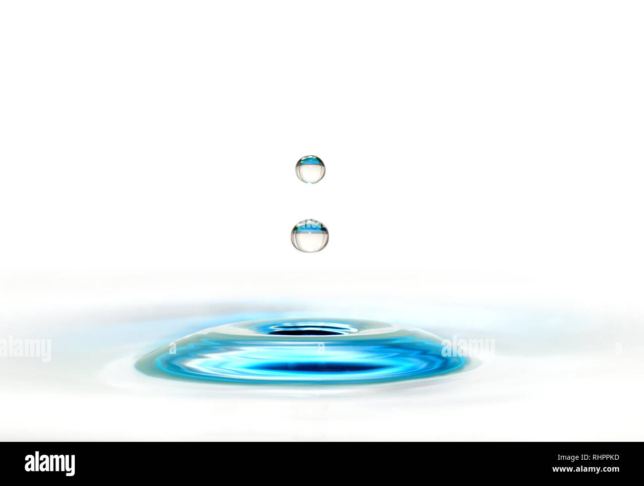 water dropping with metallic blue color Stock Photo - Alamy