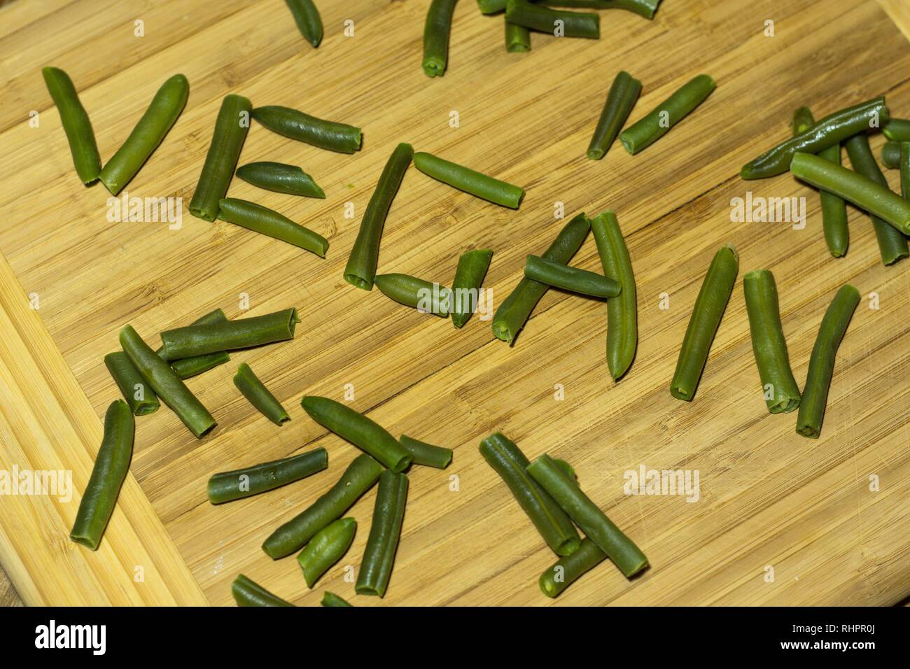 The string bean is laid out on the loaf surface. Vegan. This is a ...