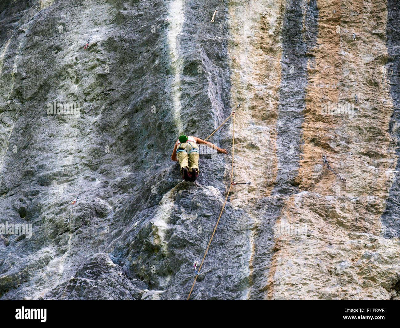 Engelberg, switzerland - july 29, 2017: climber on vertical rock face ...