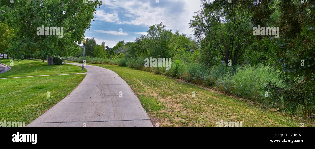 Views of Jordan River Trail with surrounding trees, Russian Olive ...