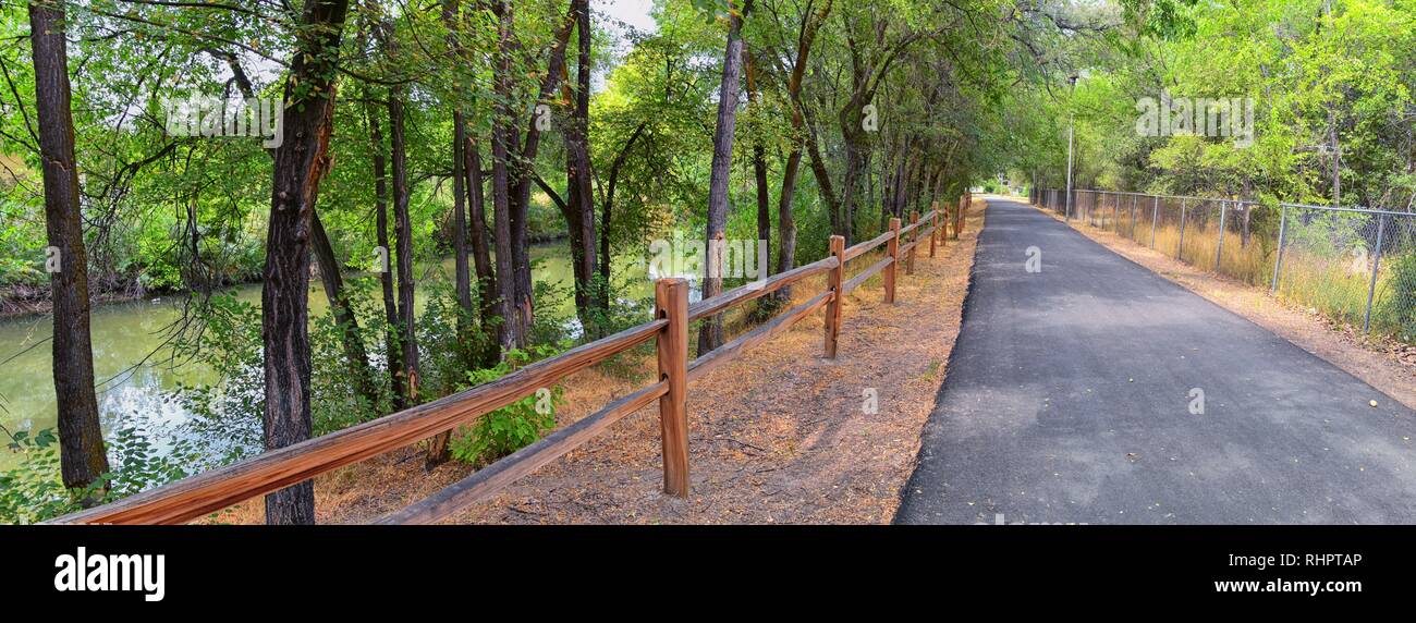 Views of Jordan River Trail with surrounding trees, Russian Olive ...