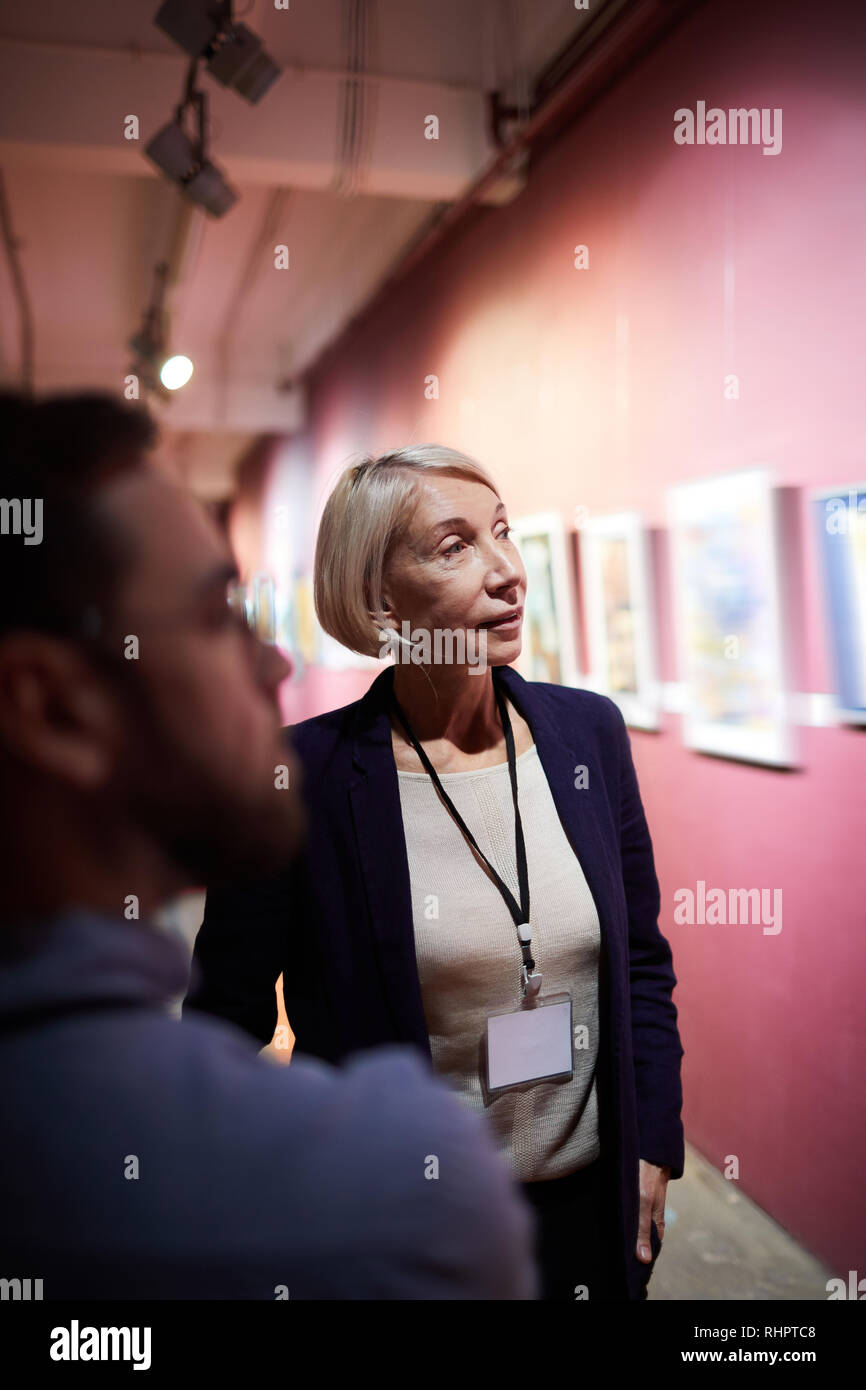 Female curator talking hi-res stock photography and images - Alamy
