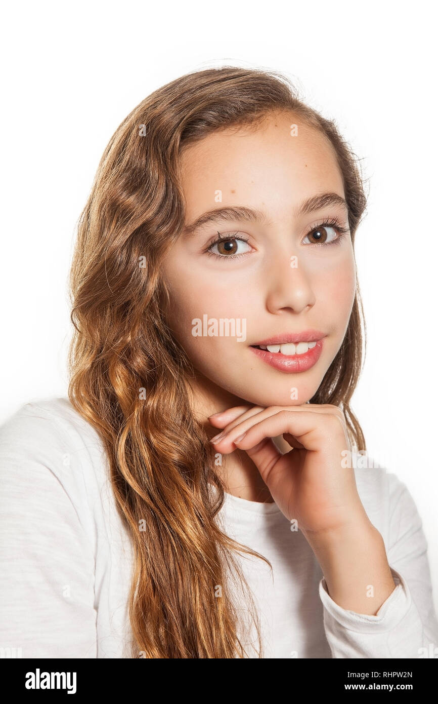 Beautiful young girl thinking or having an idea isolated on white ...