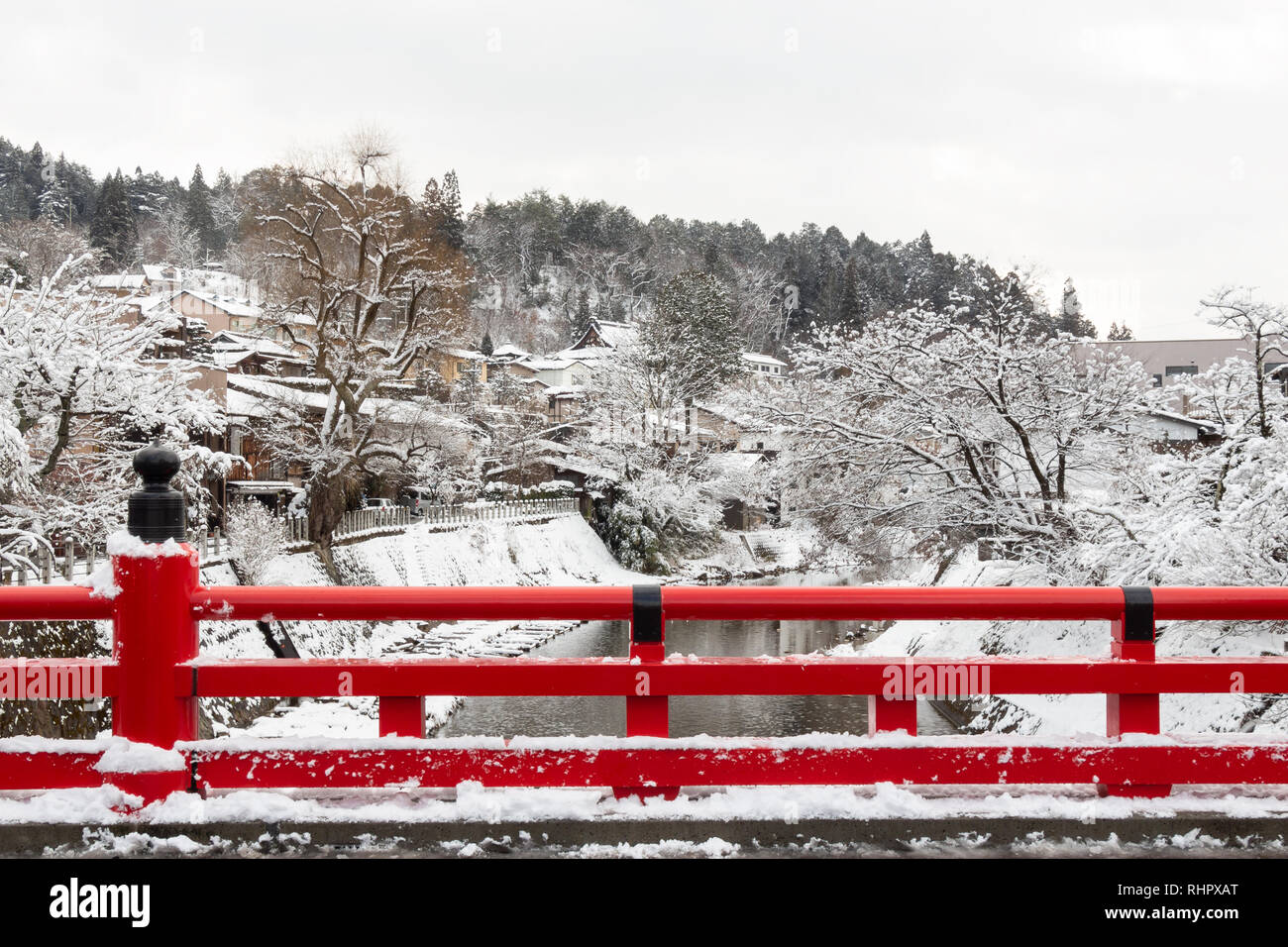 Nakabashi Bridge with snow fall and Miyakawa river in winter season ...