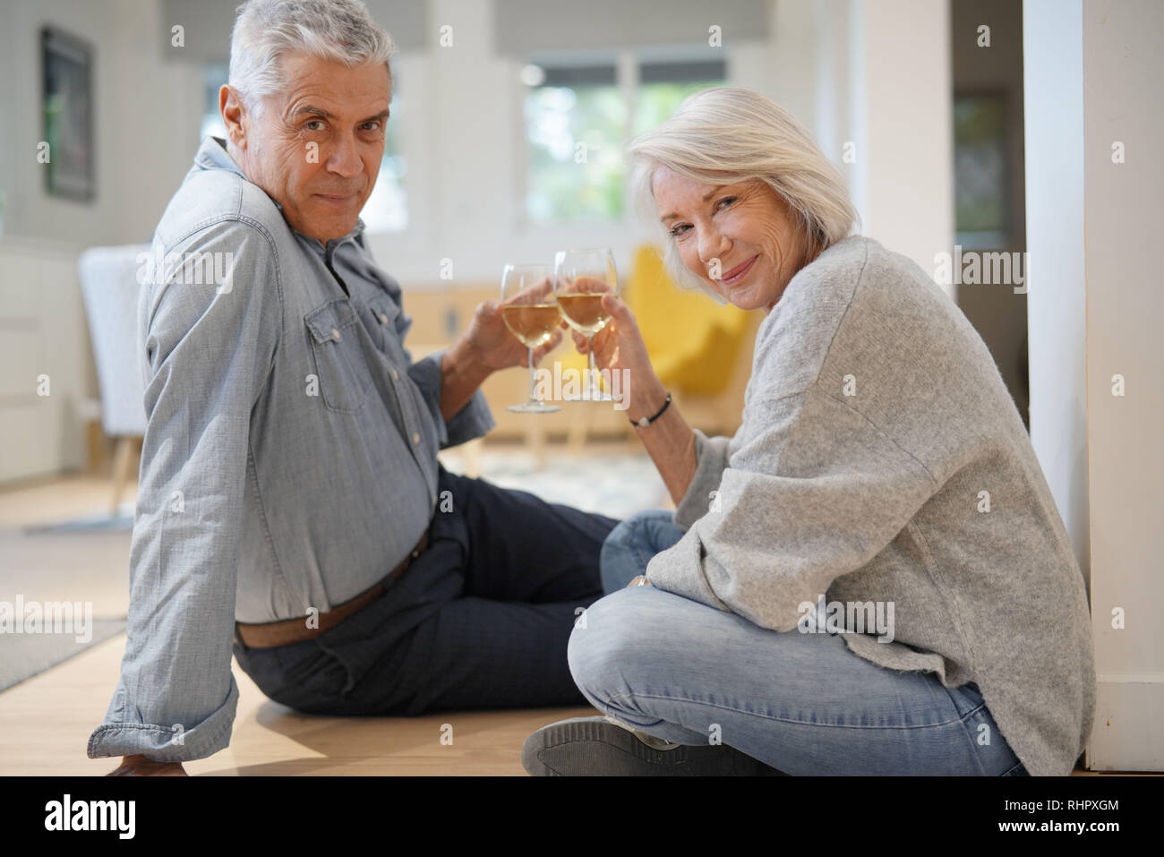 Romantic couple sharing glass hi-res stock photography and images - Alamy
