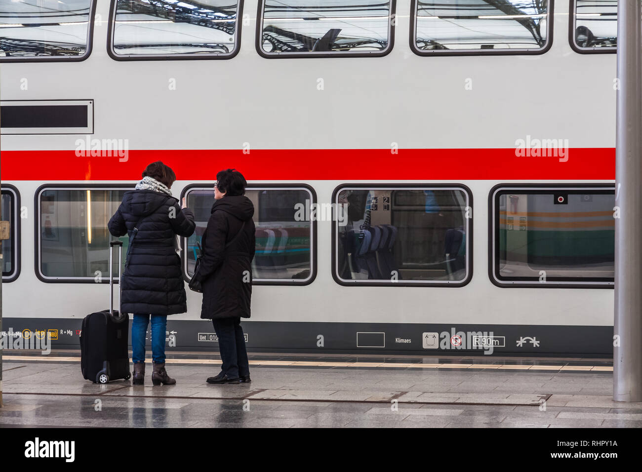 Waiting for train Stock Photo - Alamy