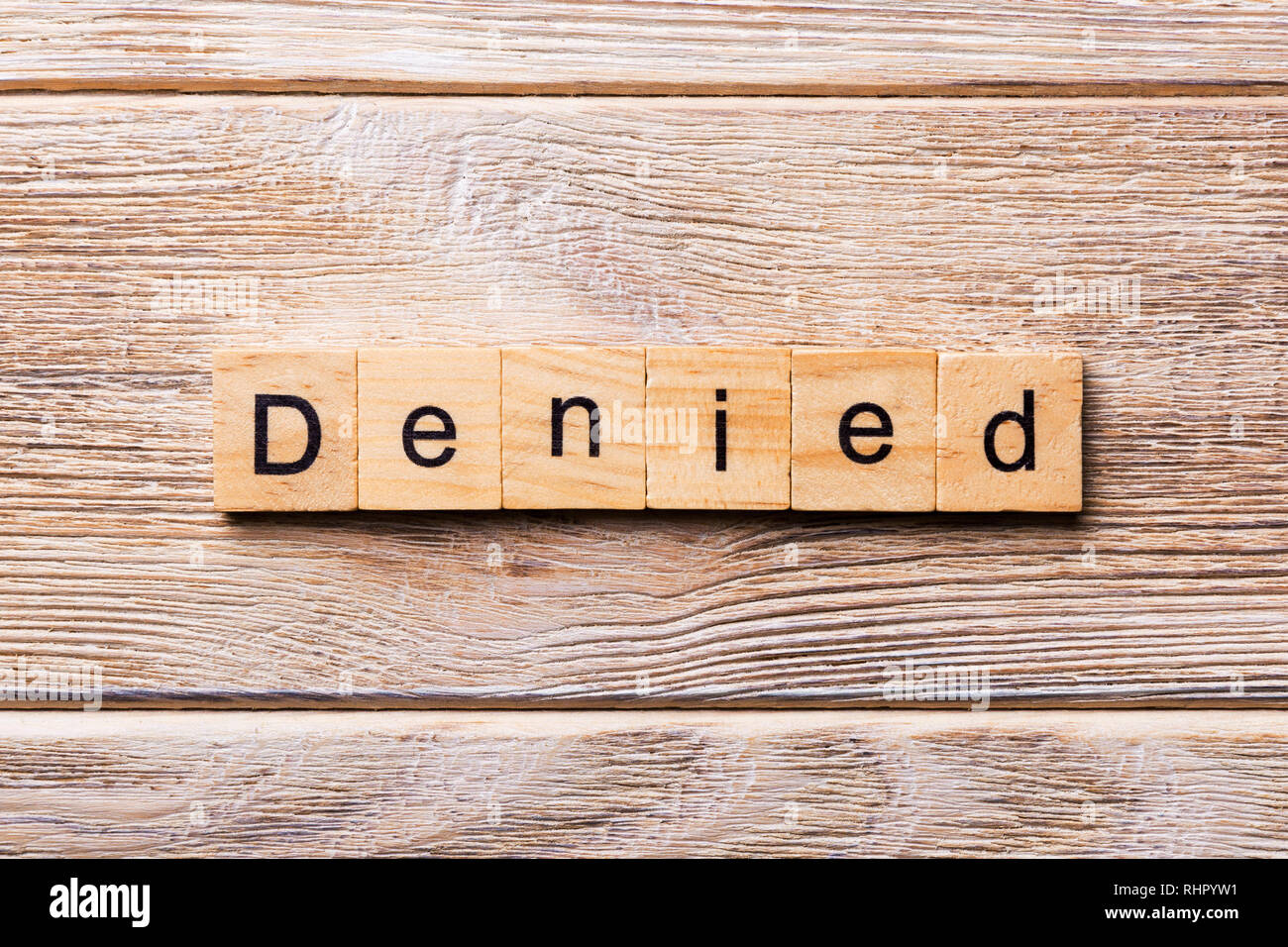 DENIED Word Written On Wood Block DENIED Text On Wooden Table For Your denied-word-written-on-wood-block-denied-text-on-wooden-table-for-your