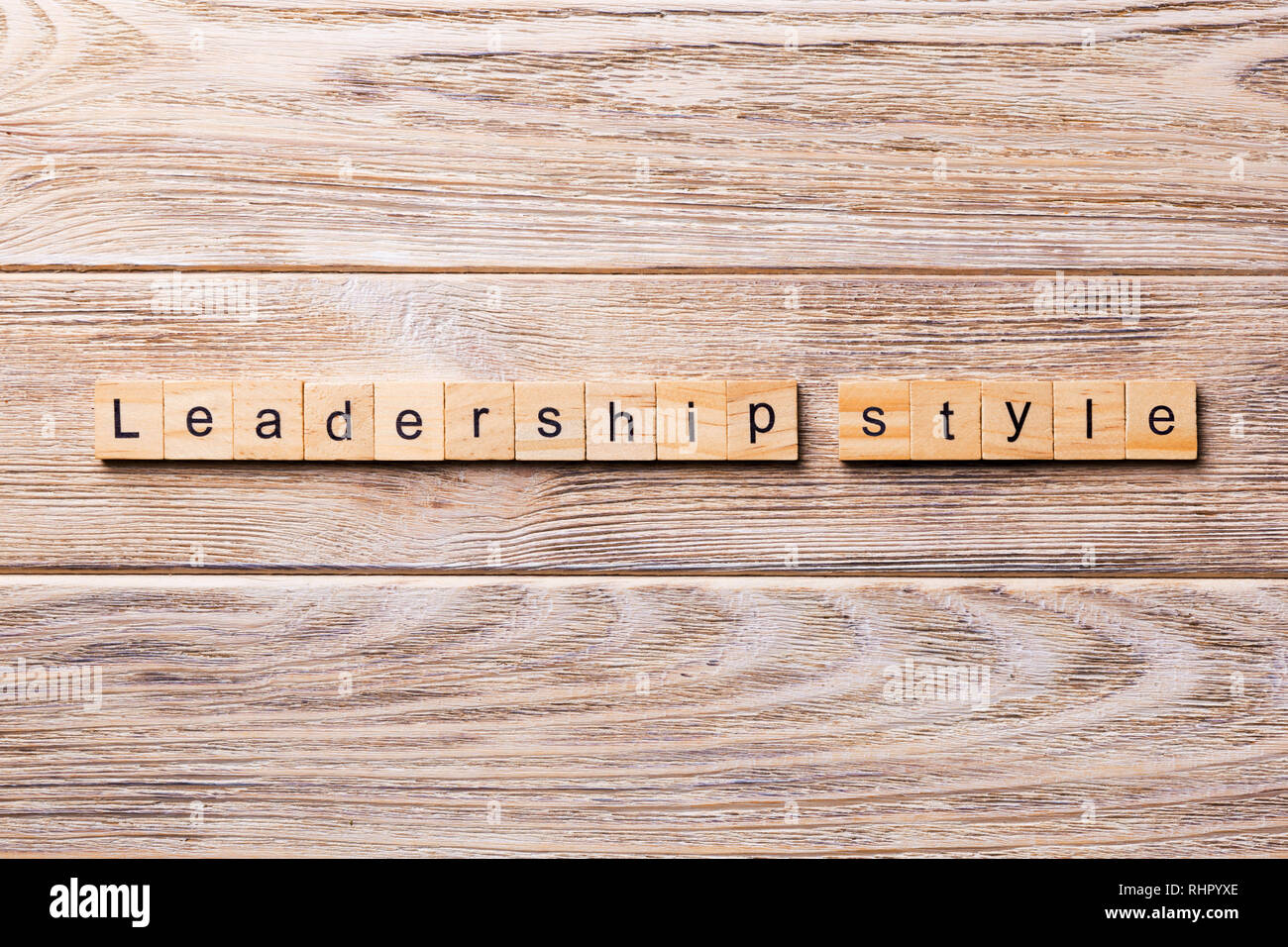 LEADERSHIP STYLE word written on wood block. LEADERSHIP STYLE text on ...